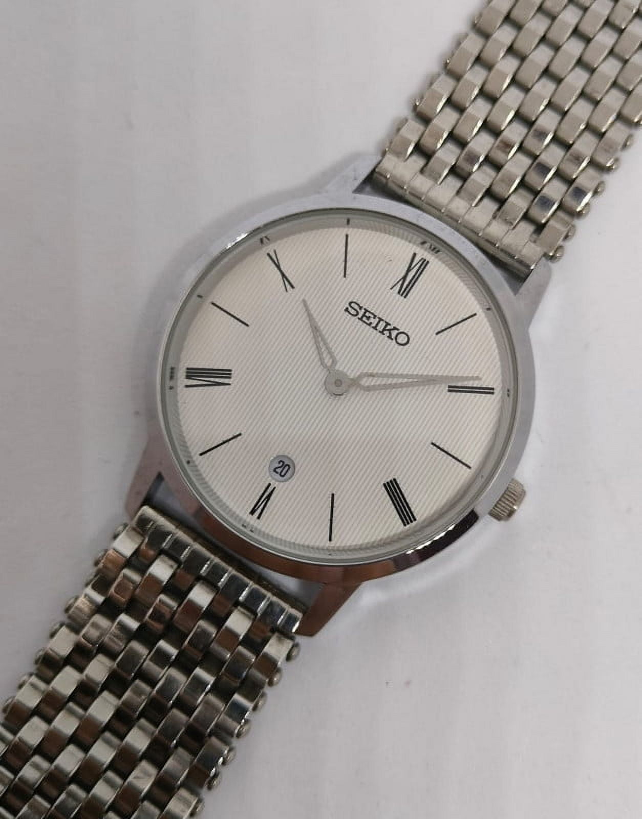 Seiko Slim Quartz Round Shape Roman Number White Dial Metal Bracelet ...