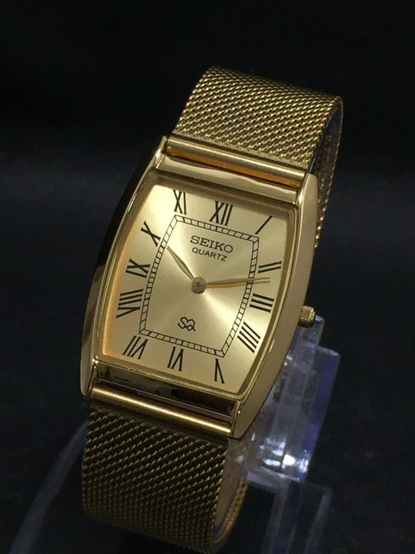 Seiko Slim SQ Quartz Roman Number Golden Dial Rectangular Golden Metal ...