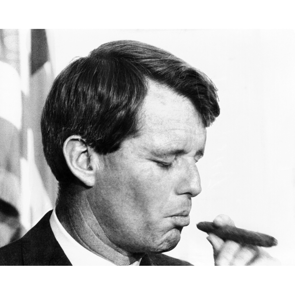 Senator Robert Kennedy Eyes A Cigar. He Was Attending A Luncheon In ...