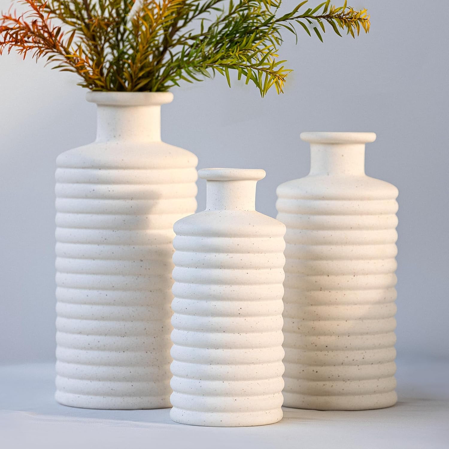 Set of White Ceramic Vases with Ribbed Texture: A Nod to Classic Ru ...