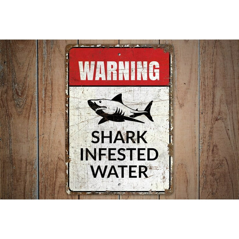 shark infested waters sign