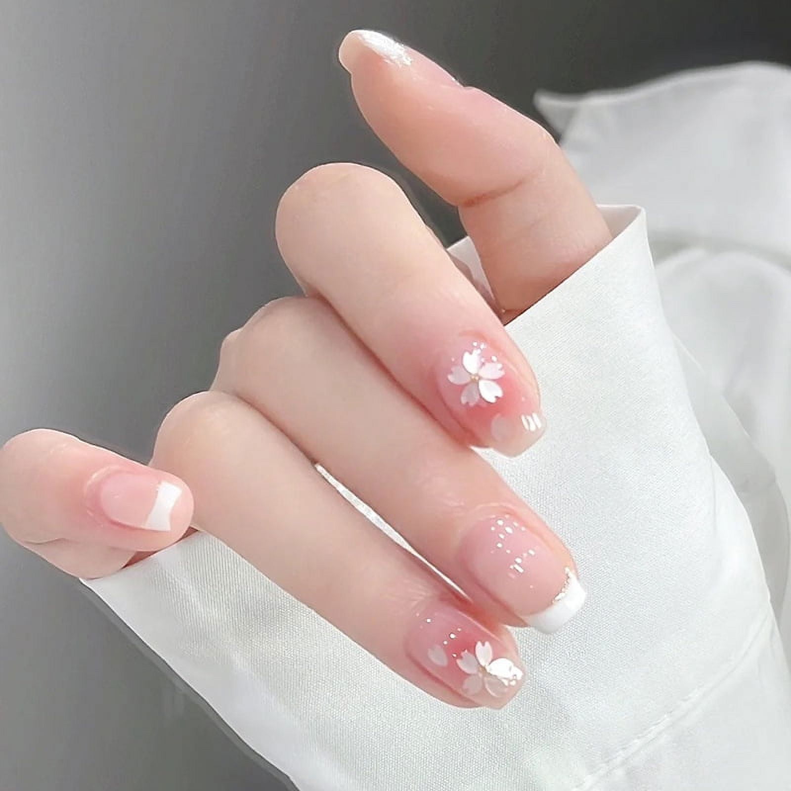 Short, thin pink and white manicure sheets, nail patches, finished high ...