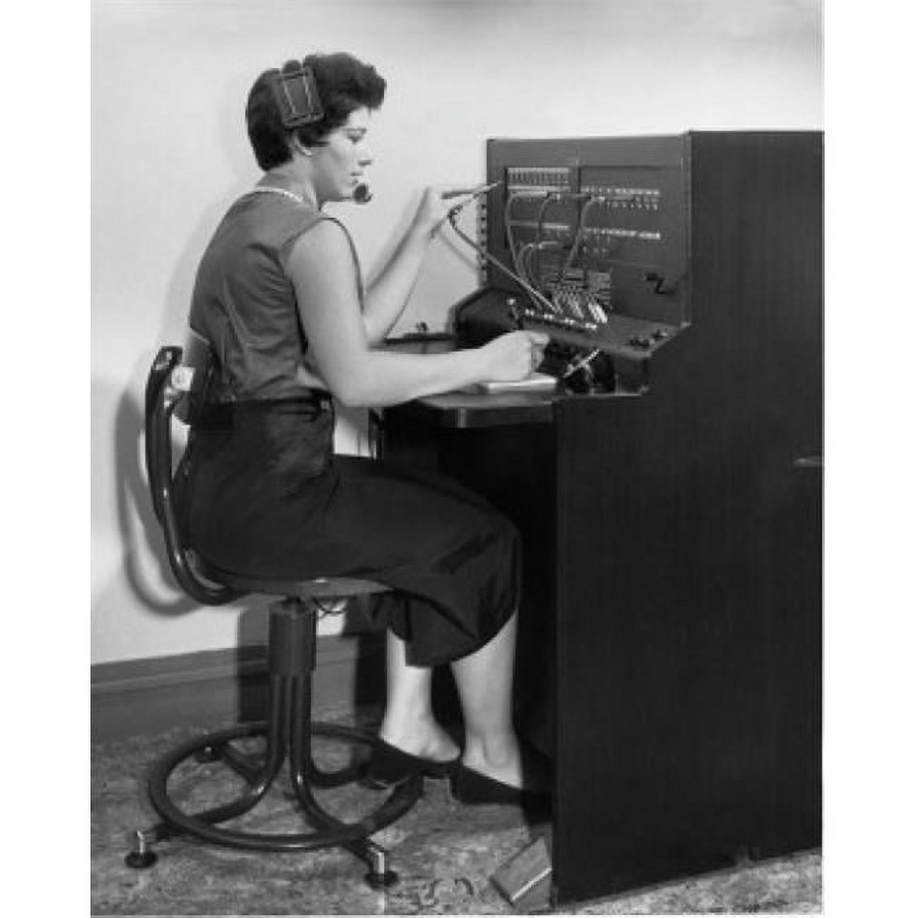 Side Profile of a Female Telephone Operator Operating a Telephone ...