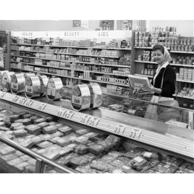 Side Profile of a Young Woman Choosing Pre-Packaged Food in a Store ...