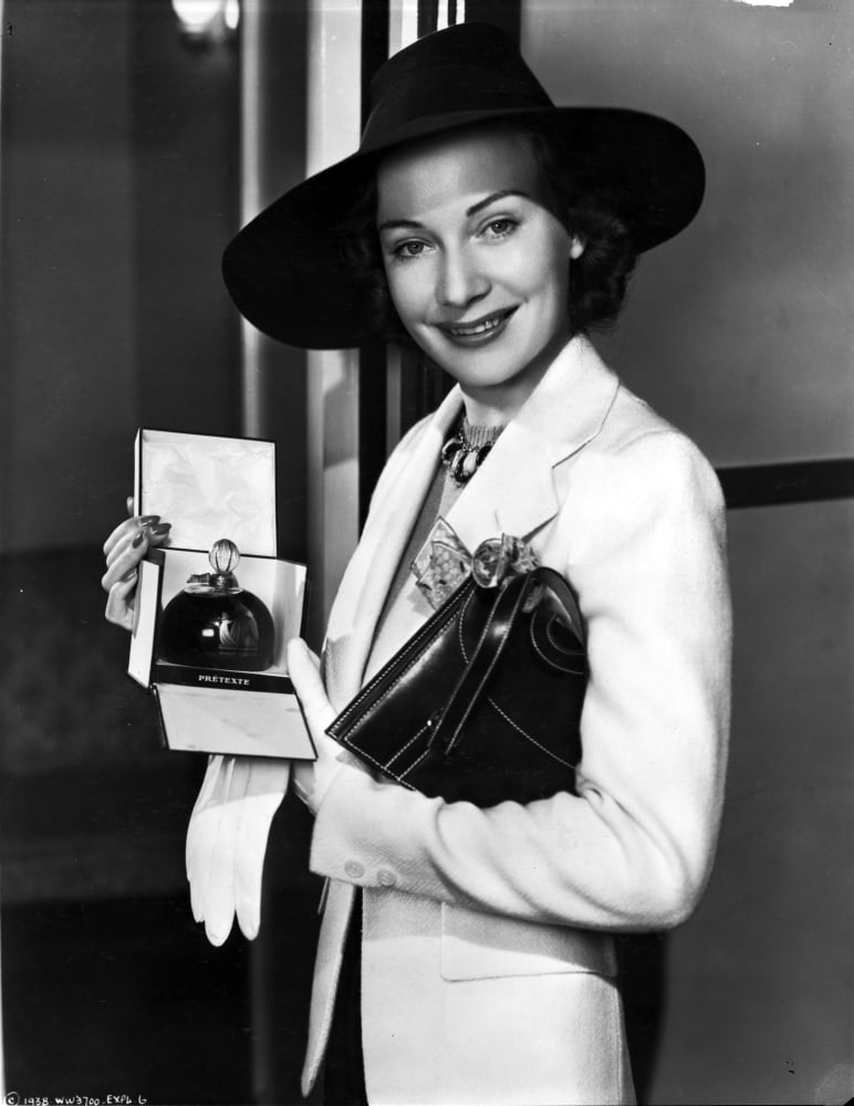 Sigrid Gurie Holding a Box of a Perfume Photo Print (8 x 10) - Walmart.com