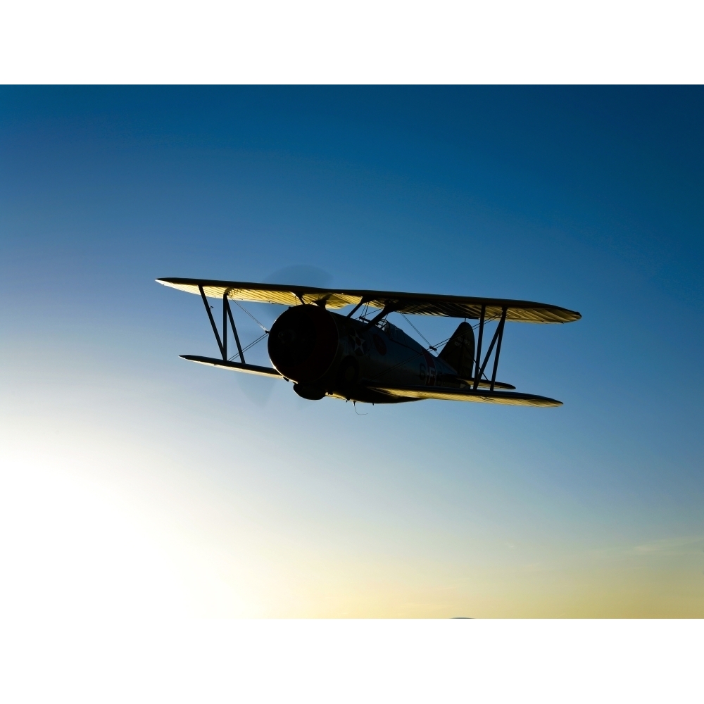Silhouette of a Grumman F3F biplane in flight Poster Print - Walmart.com