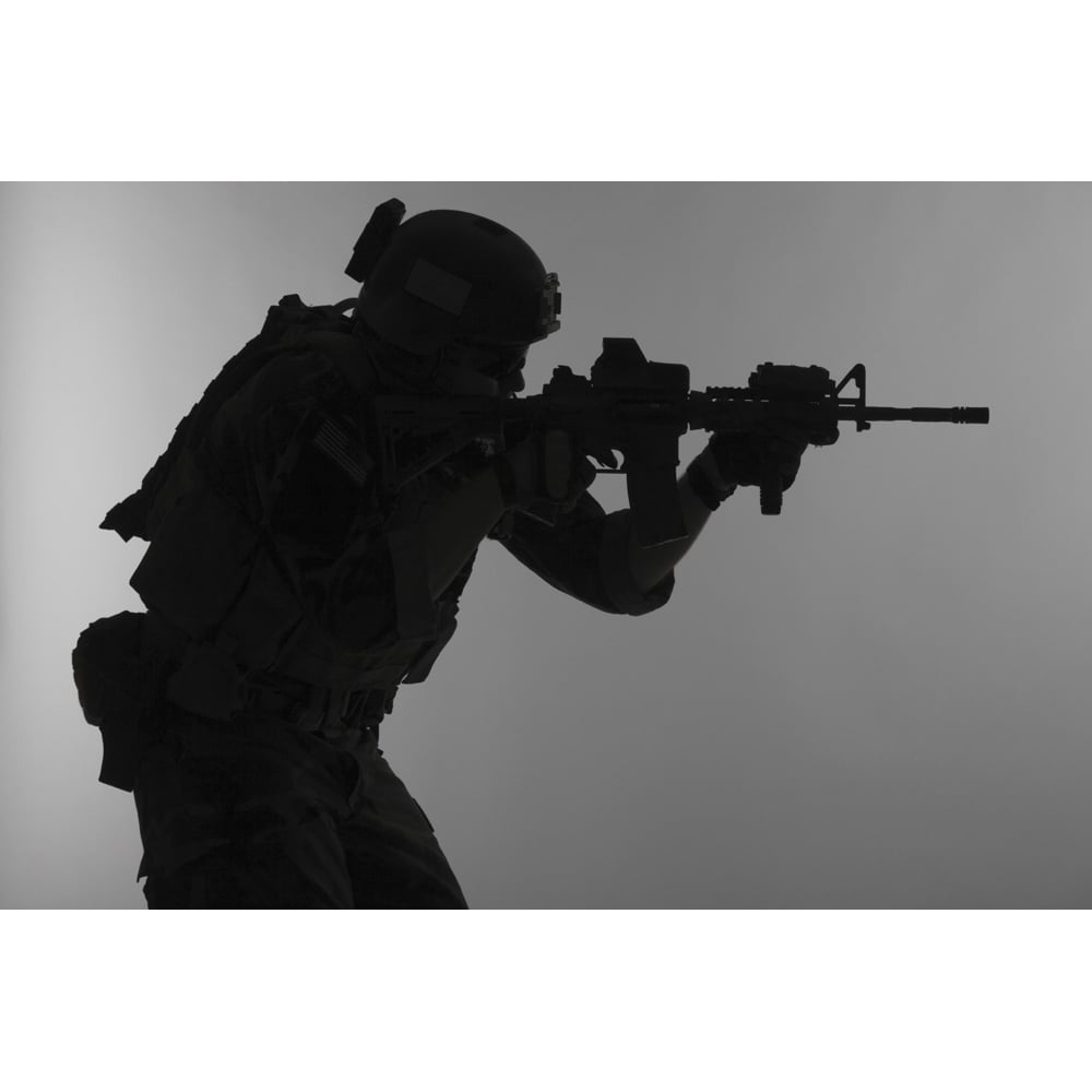 Silhouette of a U.S. Marine Corps Marsoc raider aiming gun gray ...