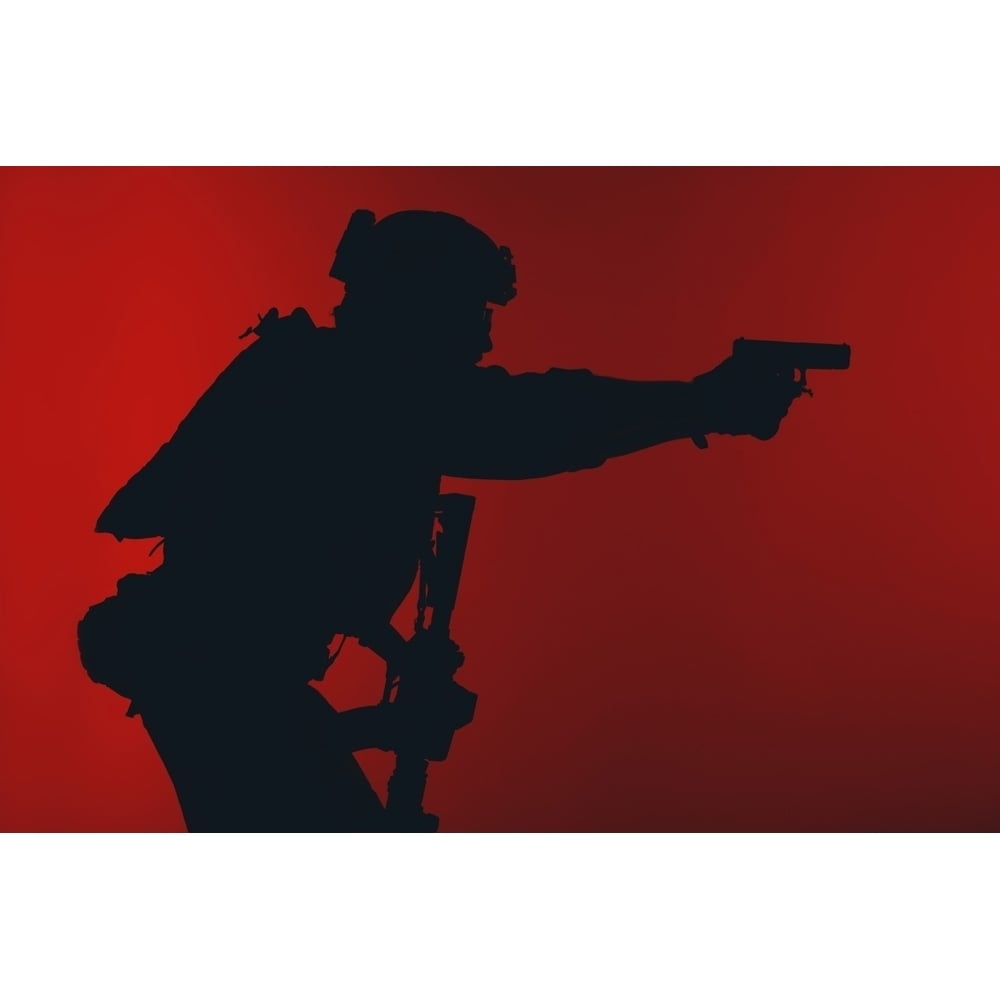 Silhouette of a U.S. Marine Corps Marsoc raider aiming pistol red ...