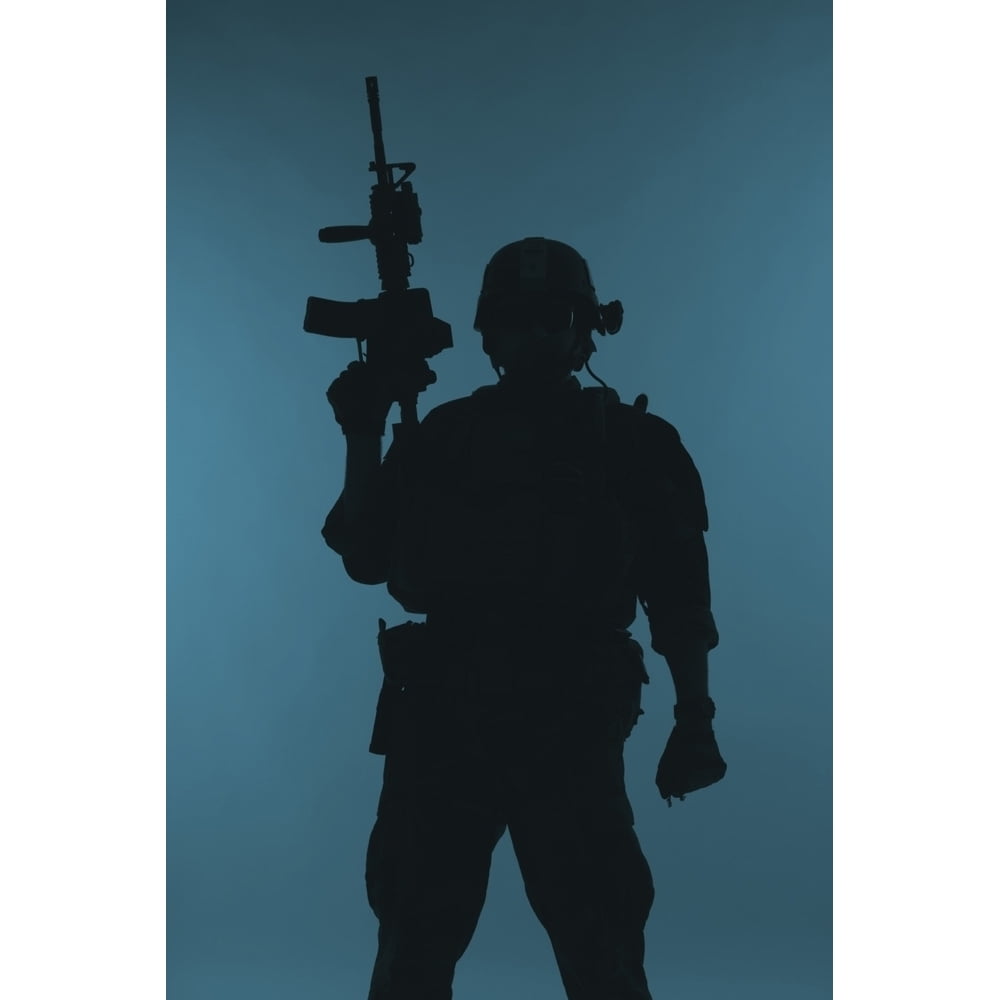 Silhouette of a U.S. Marine Corps Marsoc raider with weapon blue ...