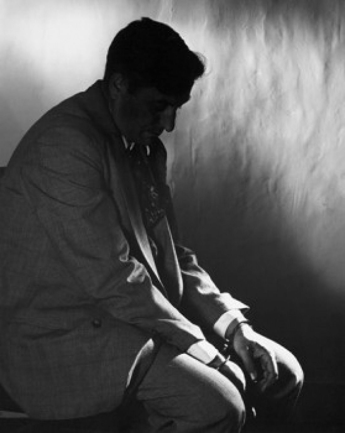 silhouette-of-a-male-prisoner-sitting-in-a-prison-cell-poster-print-18