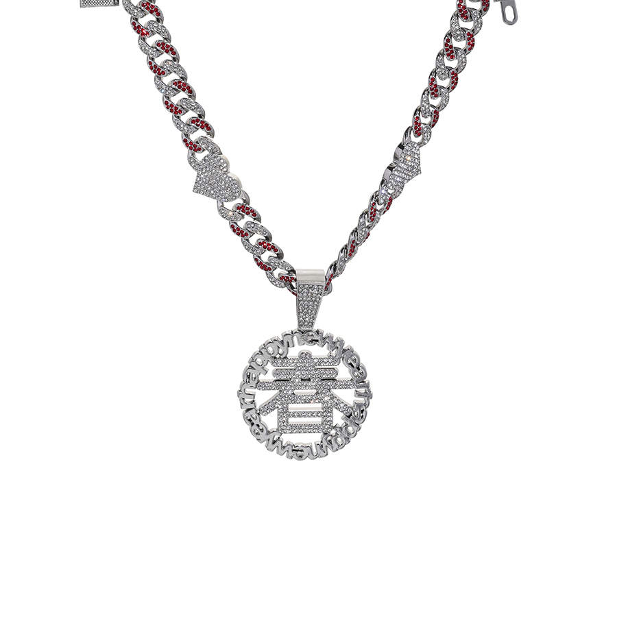 Silver heart-shaped split pendant necklace with a Cuban chain and a ...