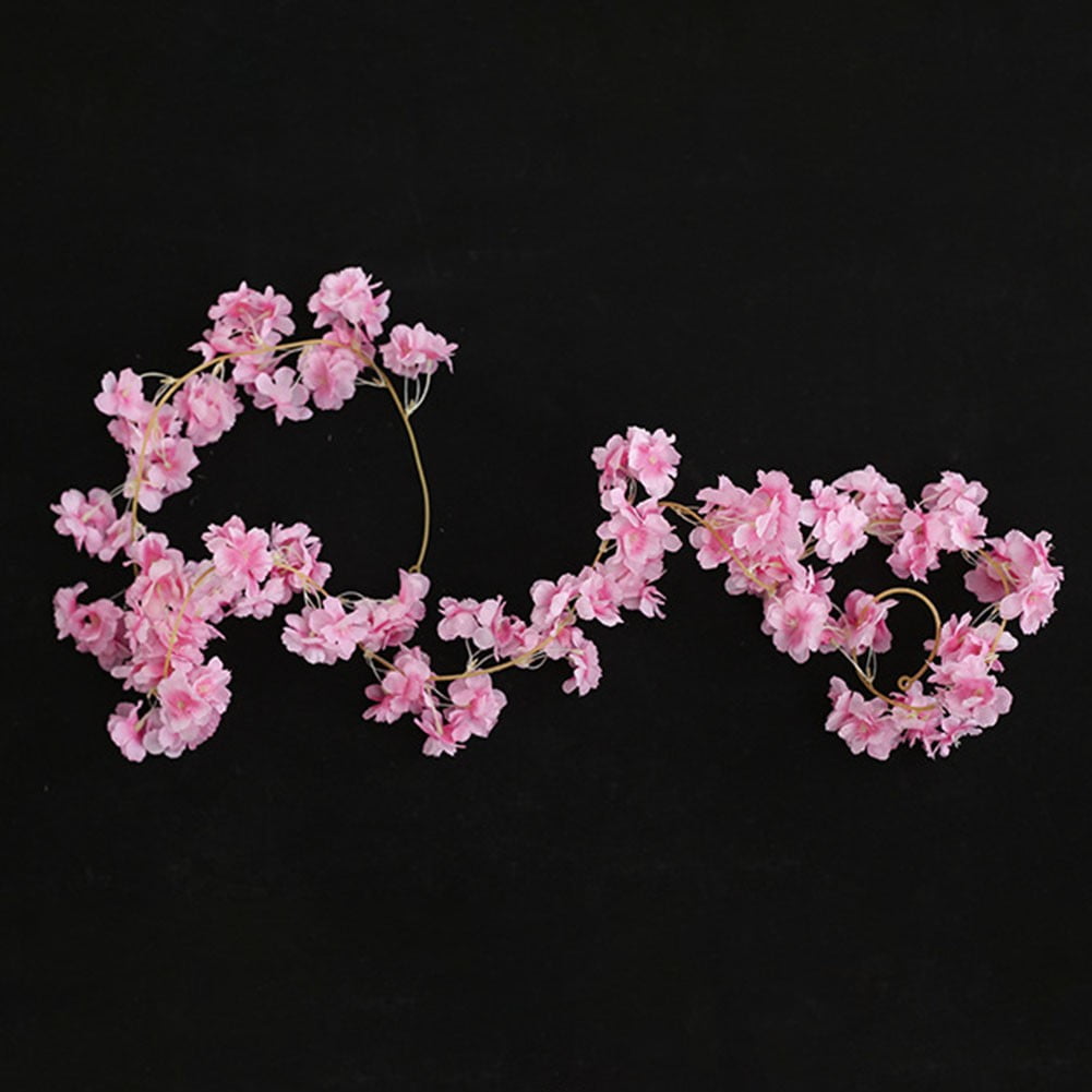 Simulated Cherry Blossom Rattan Flowers Wrapped Around Pipe Vines ...