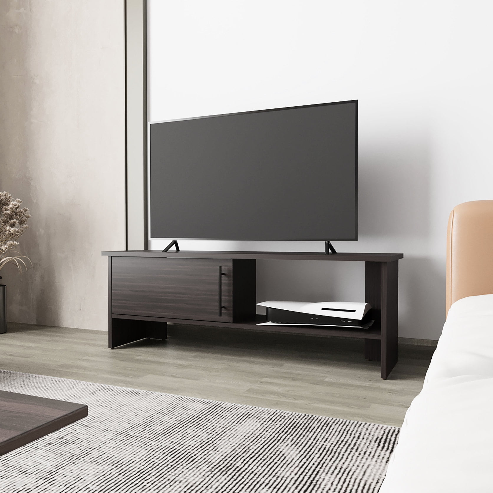 Space - efficient TV stand design - Fits in small to medium areas ...