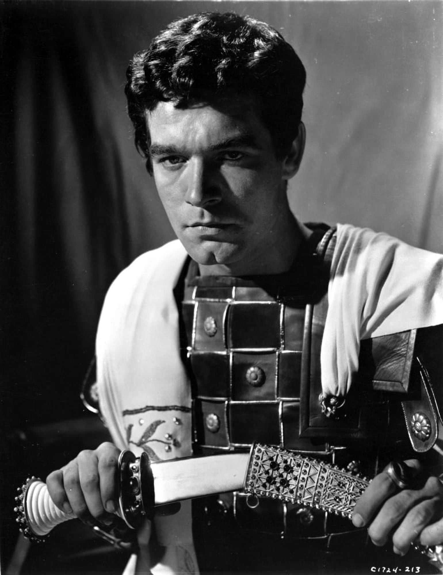 Stephen Boyd drawing a knife in a historical costume Photo Print (24 x ...