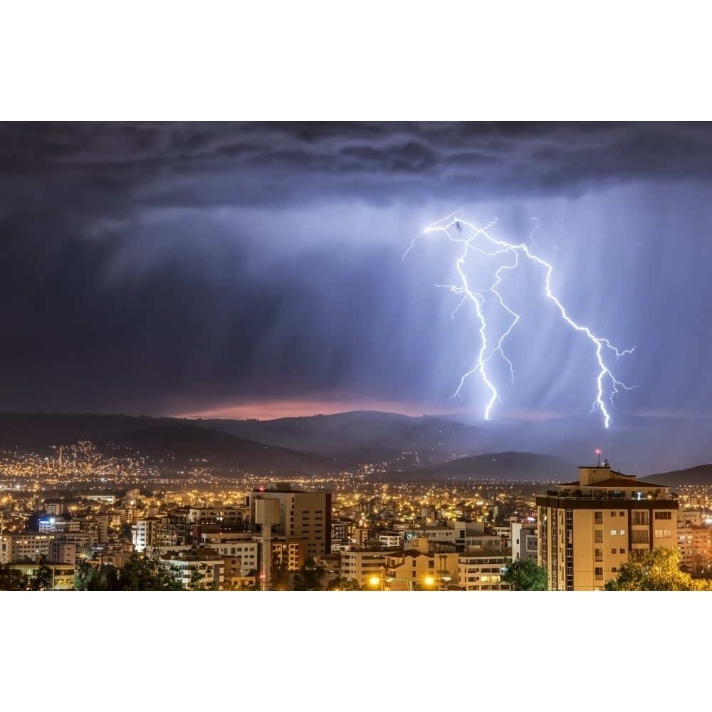 Stormy skies and over a city at night; Cochabamba Bolivia by Robert Postma / Design Pics ...