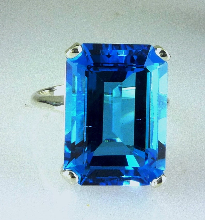 Natural Large Swiss-Blue-Topaz-Emerald-Cut Solitaire Ring Top Color,15 ...