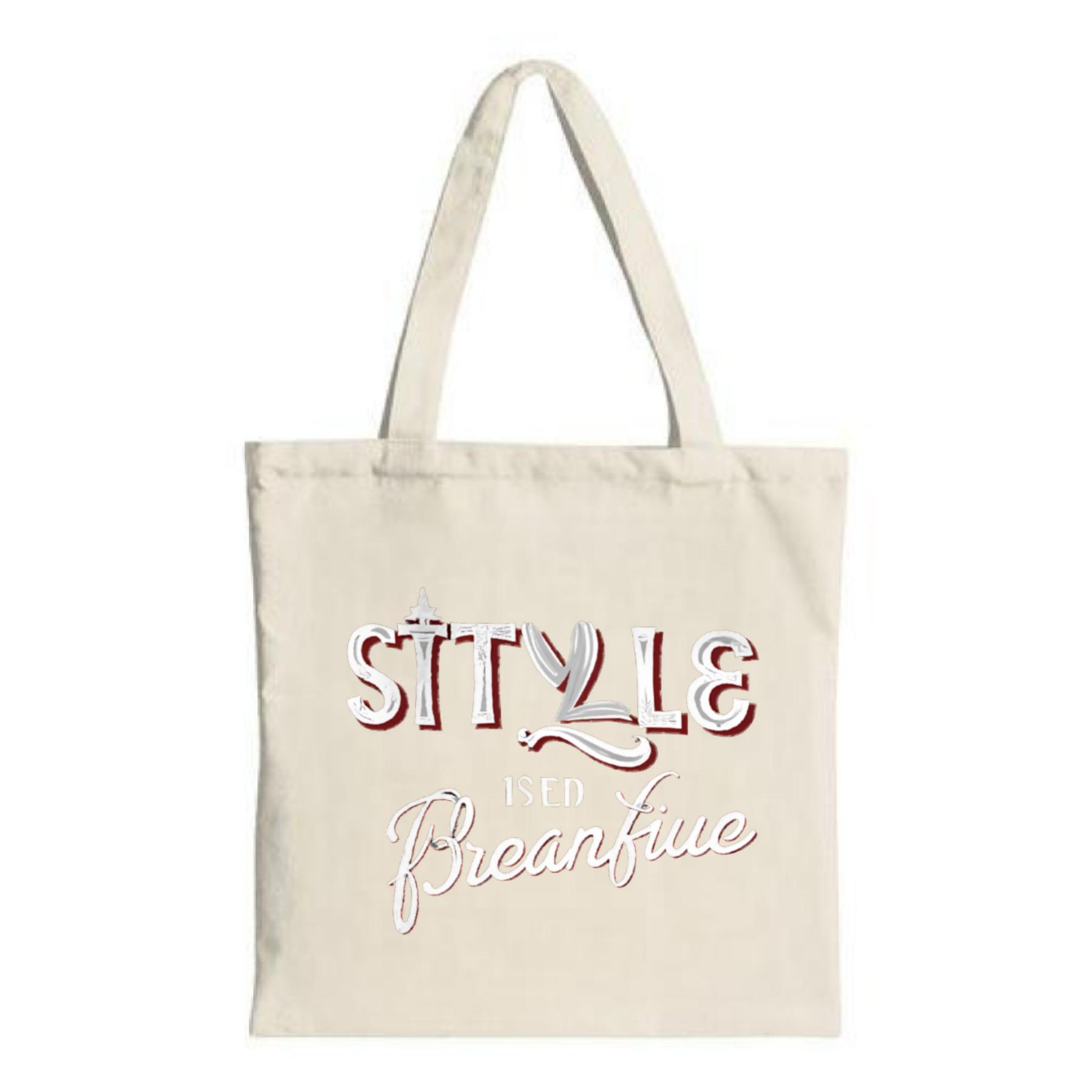 Stylish canvas tote bag with two handles featuring bold " STYLE ISD ...