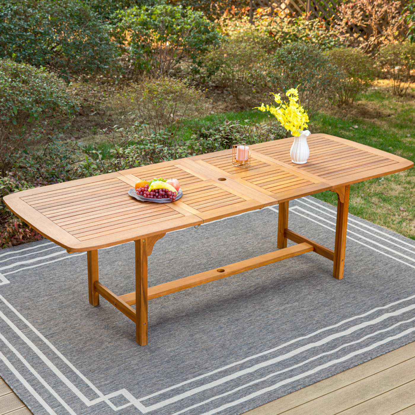 Extendable patio table with umbrella hole store