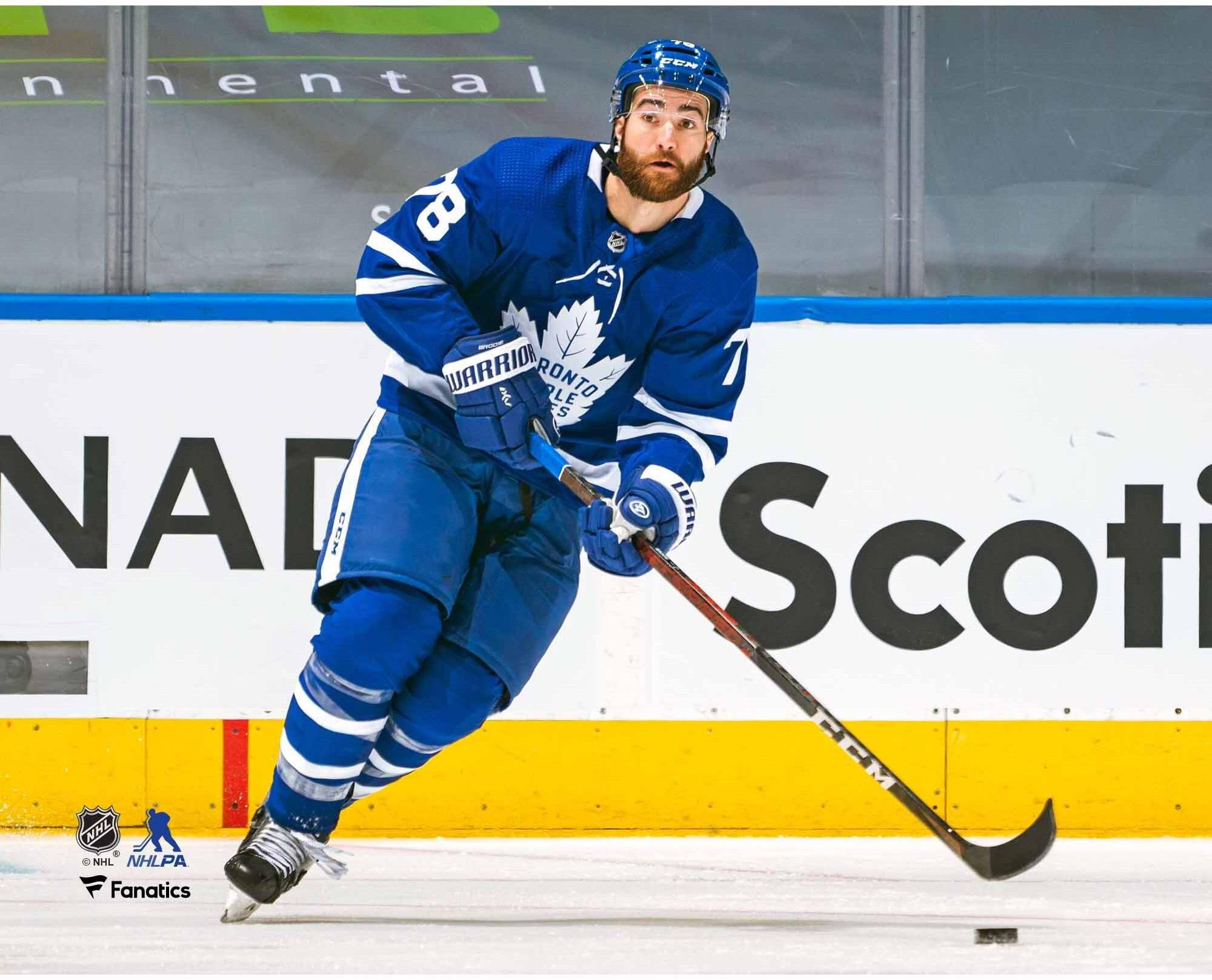 T.J. Brodie Toronto Maple Leafs Unsigned Blue Jersey Skating with Puck ...
