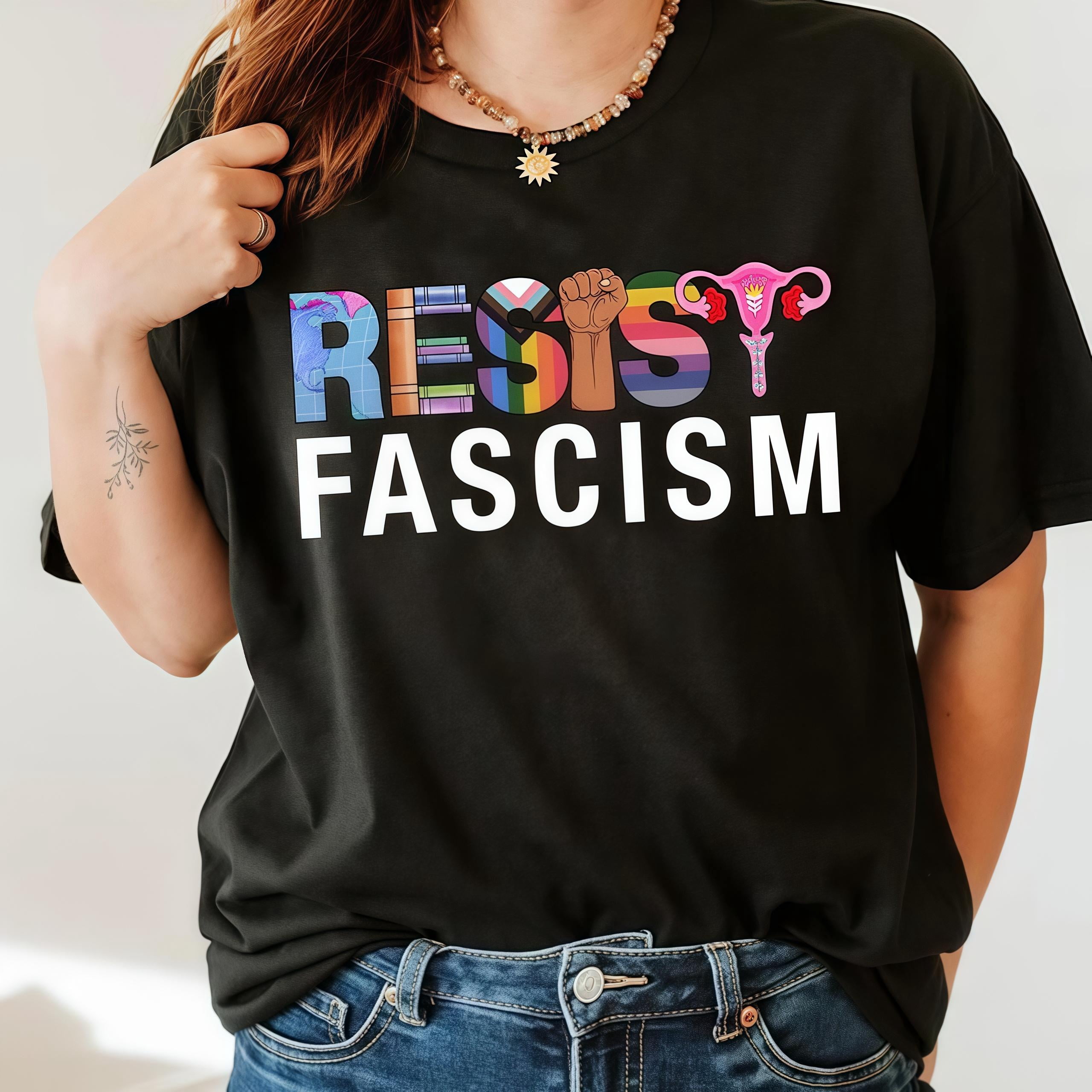 T - shirt with “RESIST FASCISM” slogan, using diverse symbols like a ...