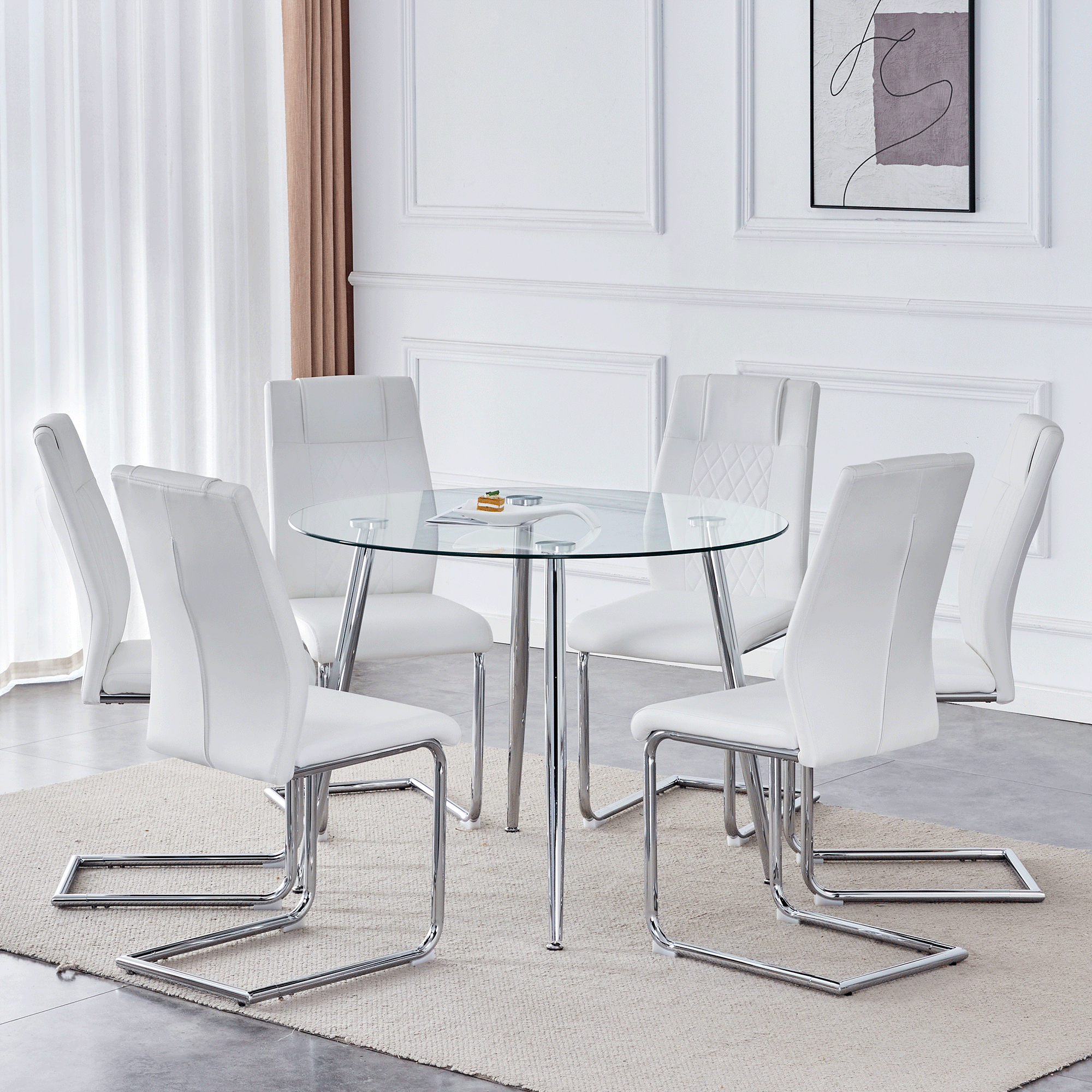 Table and Chair Set.A Modern Minimalist Round Dining Table with ...