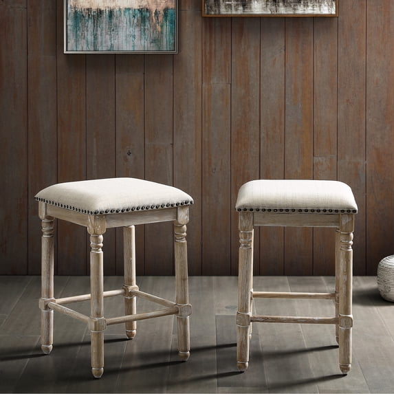 Tan upholstered with brown wood tone | In a dining room setup | Have an ...