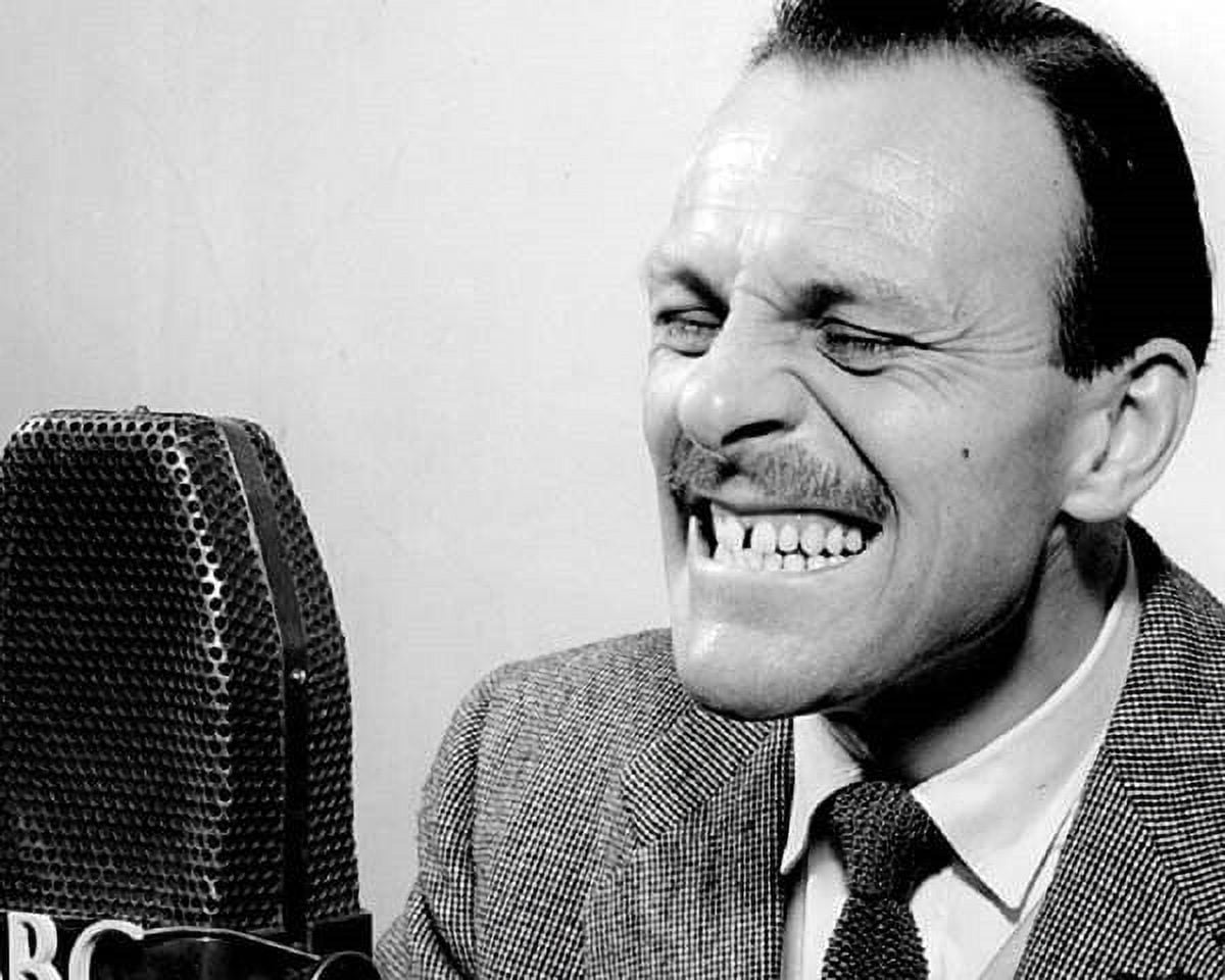 Terry-Thomas does his famous toothy grimace before BBC microphone 24x30 ...