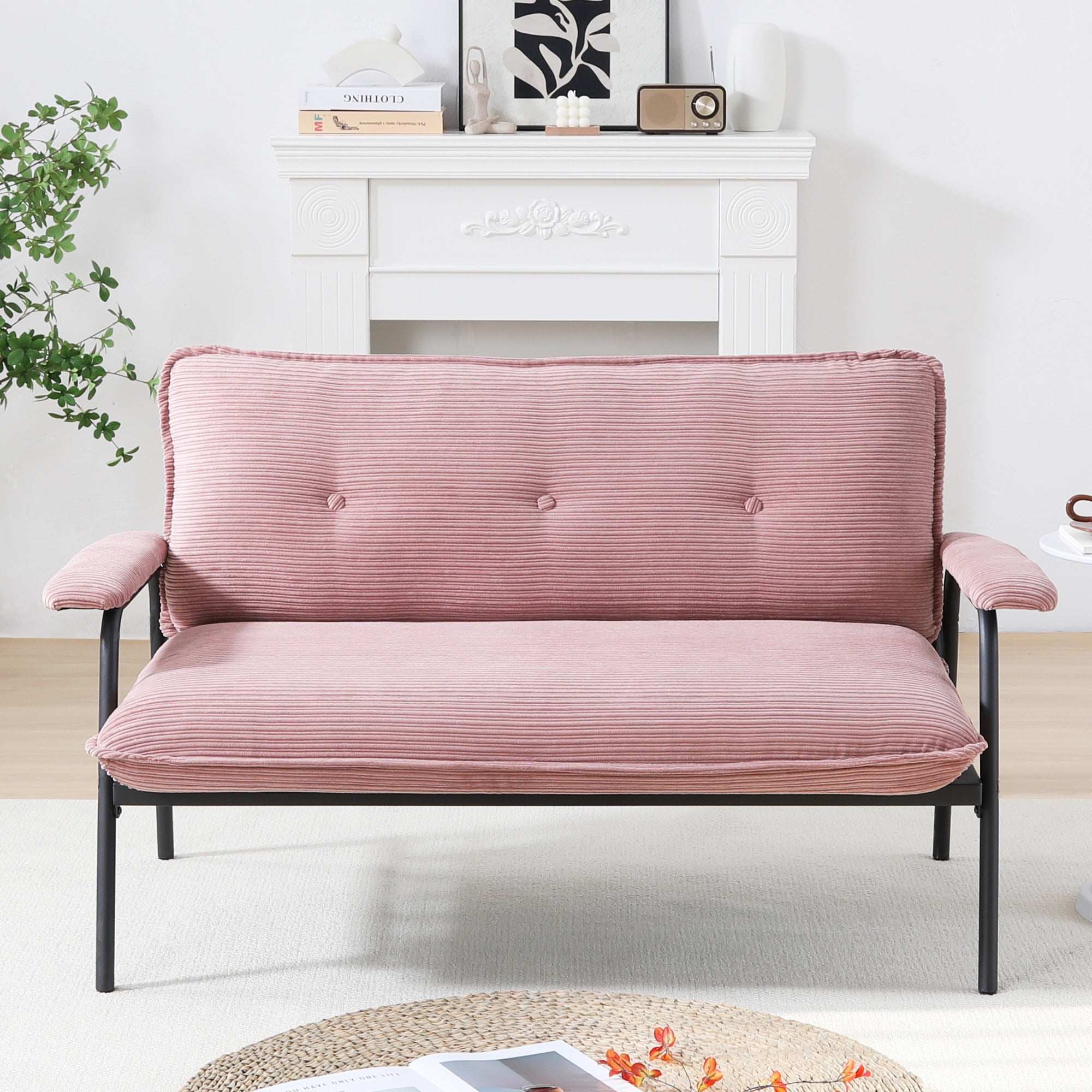 The 53-inch pink sofa offers a spacious layout in the small apartment ...