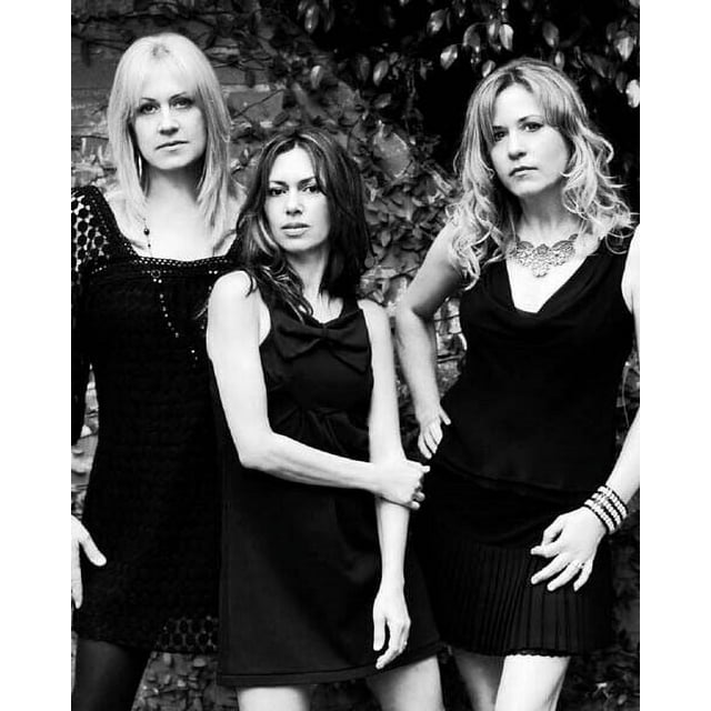 The Bangles Susannah debbie and Vicki porytrait wearing black dresses ...