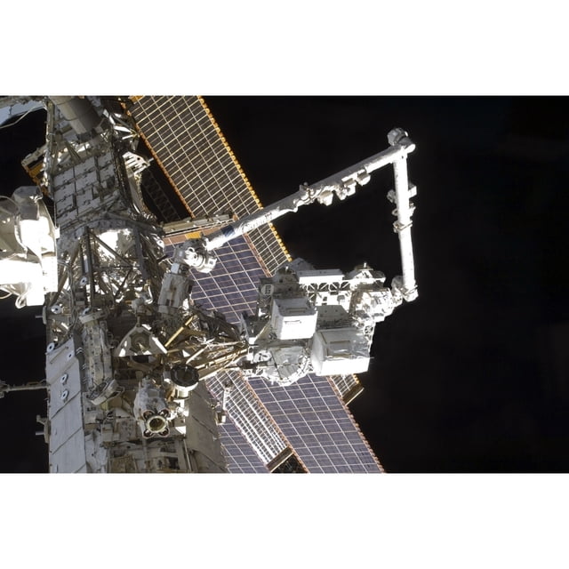 The Canadarm2 mates the Express Logistics Carrier to the Outboard ...
