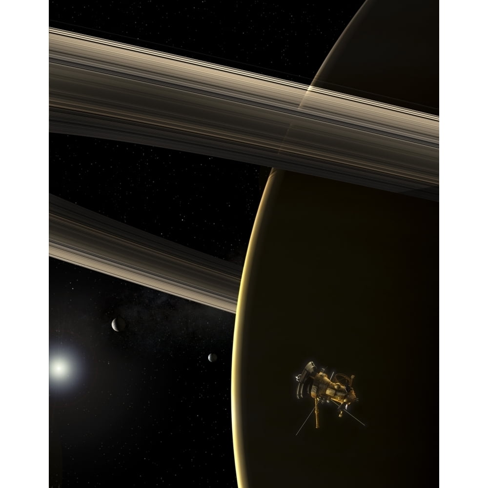 The Cassini spacecraft in orbit around the planet Saturn during sunrise ...