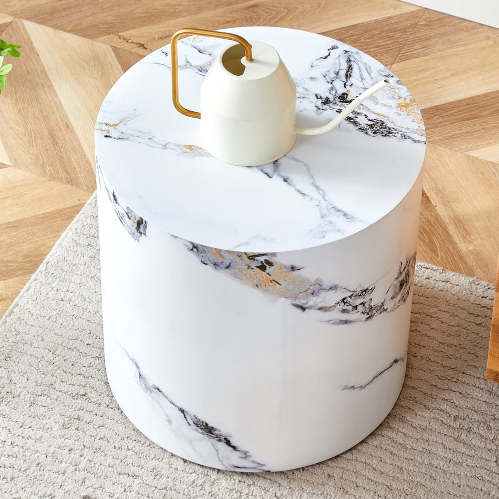 The cylindrical table with its patterned design can be easily ...