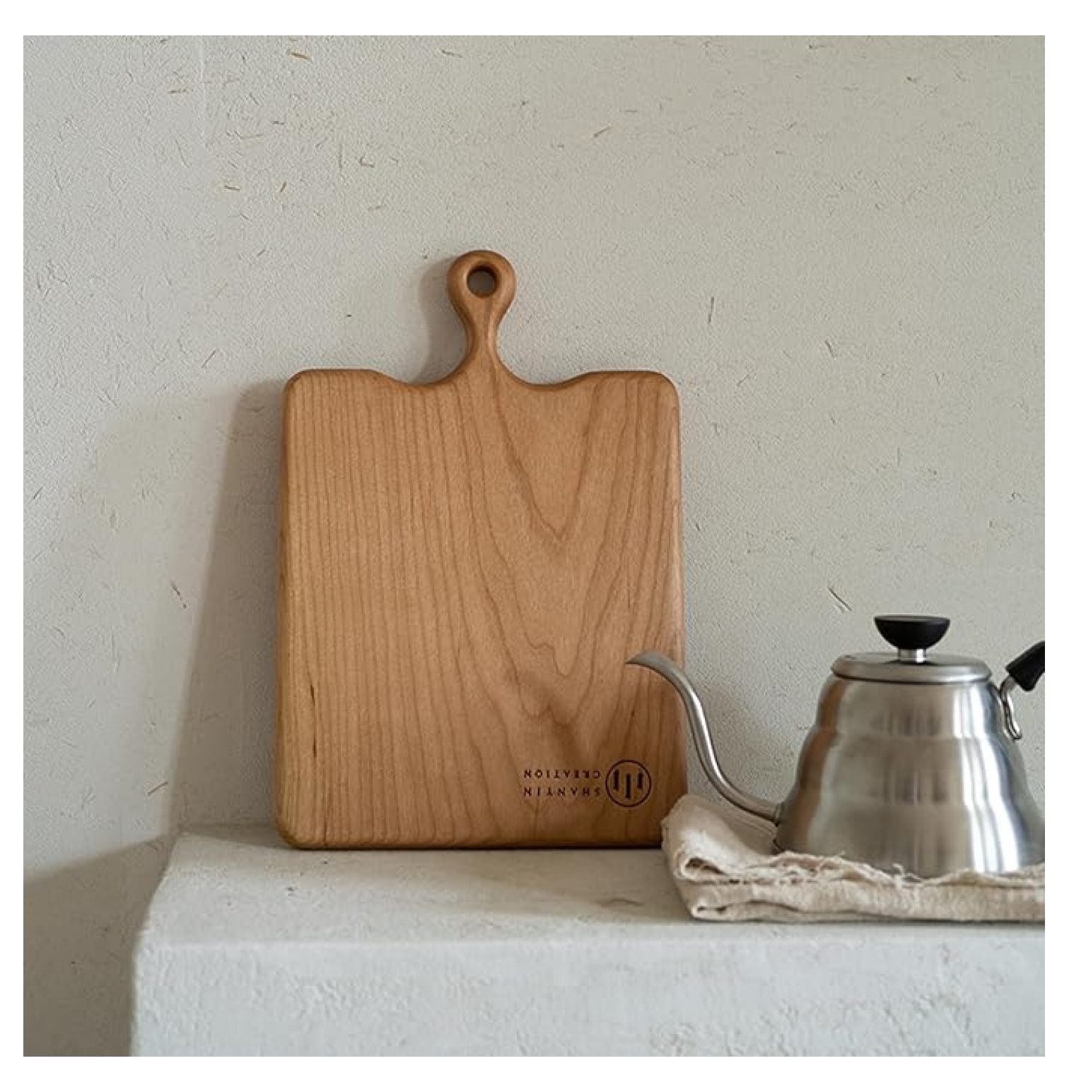 The kitchen cutting board made of wood and black walnut wood is of ...