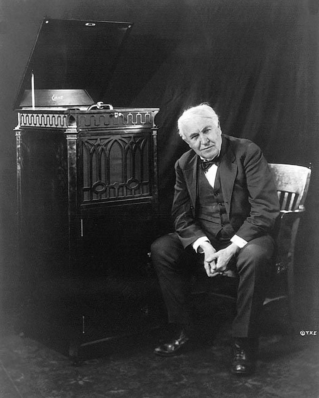 Thomas Edison Seated by Phonograph - 12x18 Inch Laminated Poster ...