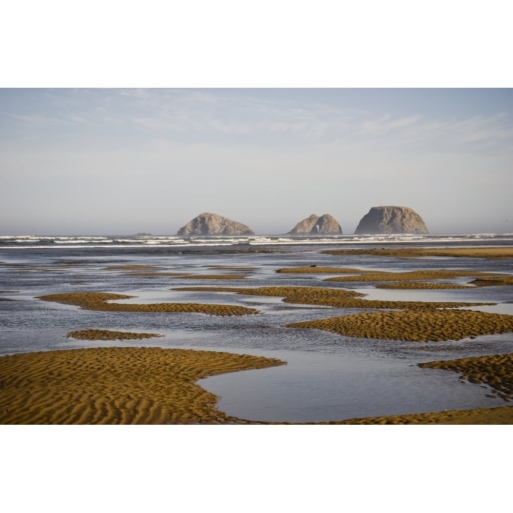 Three Arch Rocks are viewed from the mouth of Netarts Bay; Netarts ...