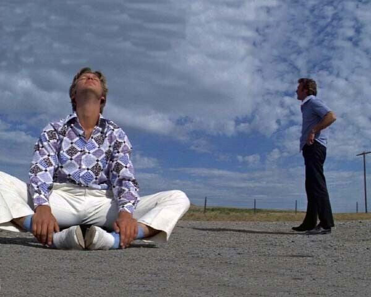 Thunderbolt and Lightfoot Jeff Bridges sits as Clint Eastwood stands ...