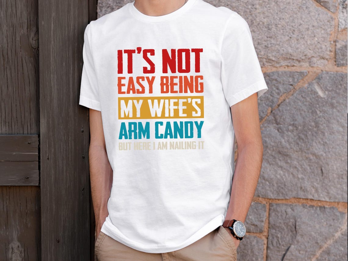 Tiny Hug It'S Not Easy Being My Wife Arm Candy Shirt, Husband Shirt ...