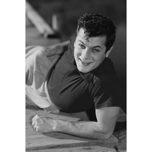 Tony Curtis hunky grin laying on pier flexing muscle 24x36 Poster ...