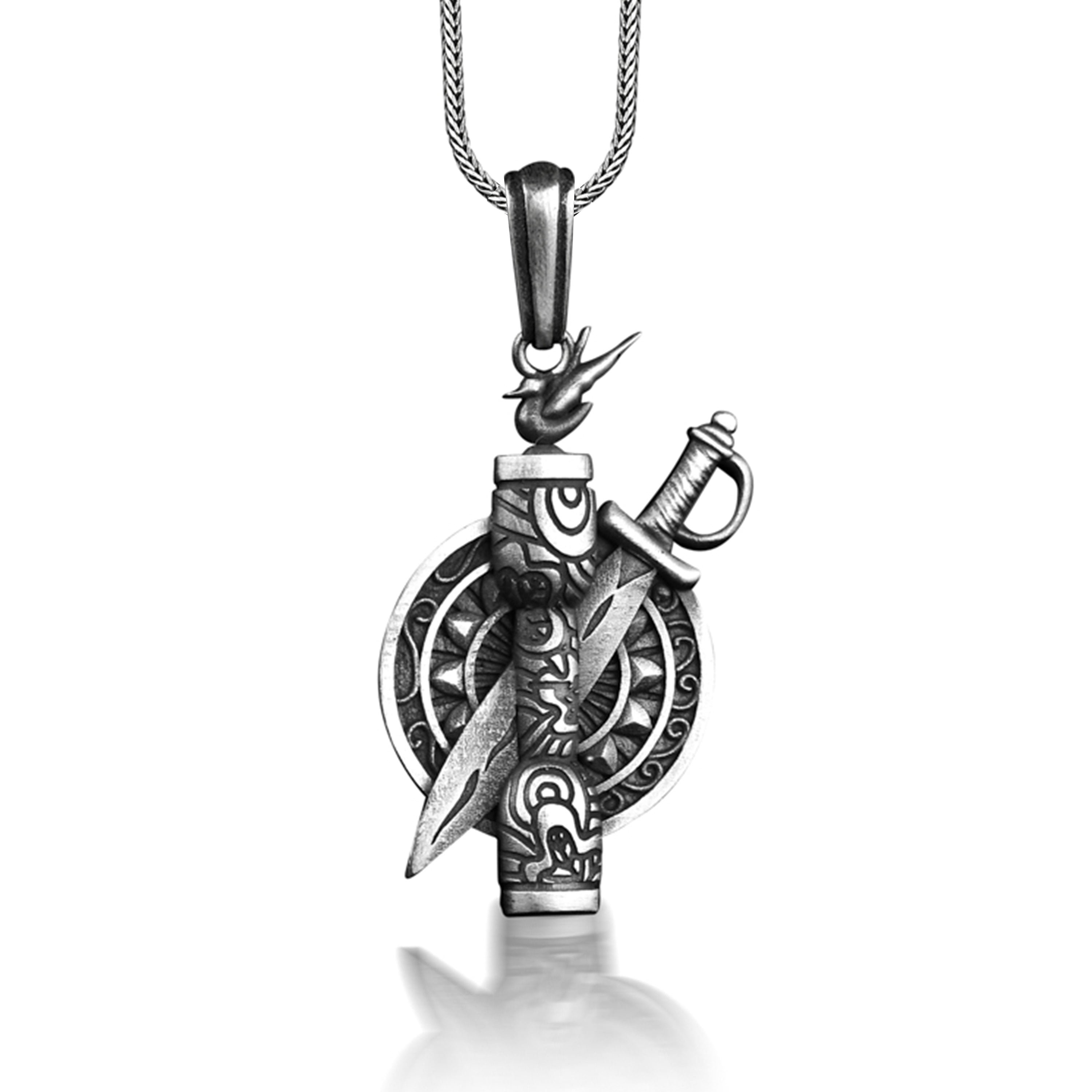 Totem pole and dagger spiritual necklace in silver, African religious ...