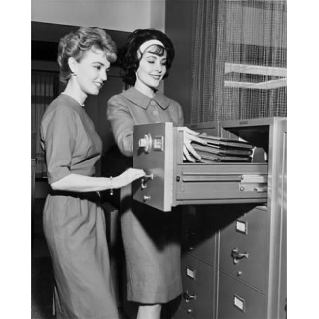 Two Female Office Workers Arranging Files in Filing Cabinet Poster ...
