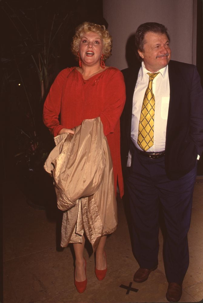 Tyne Daly All Red Outfit Holding Jacket With John Karlen In Yellow Tie ...