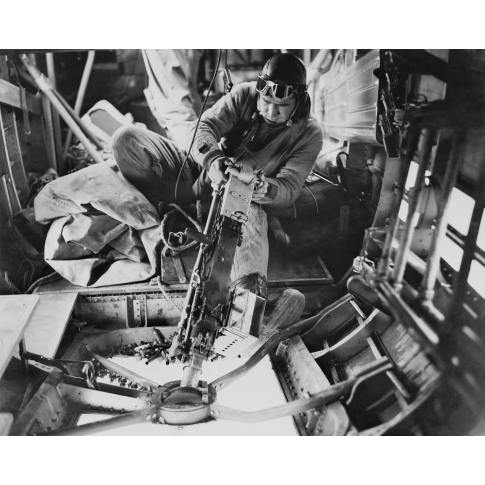 U.S. Army Air Force Gunner Operating A Machine Gun During A Aerial ...