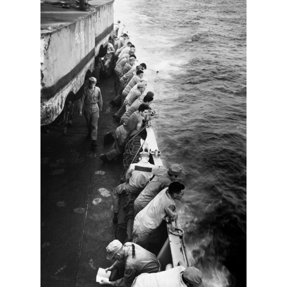 U.S. Marines Stand Along The Rail Of The Uss Clymer Taking Them To ...