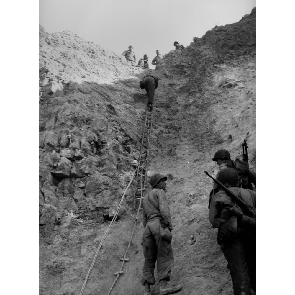 U.S. Rangers Climb A Cliff Using A Rope Ladders At The Pointe Du Hoc ...