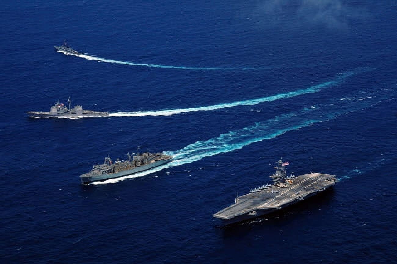 The USS Bunker Hill, the USNS Rainier, and the BAP Carvajal break away ...