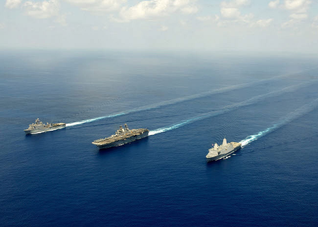 USS Pearl Harbor, USS Makin Island, and USS New Orleans transit the ...