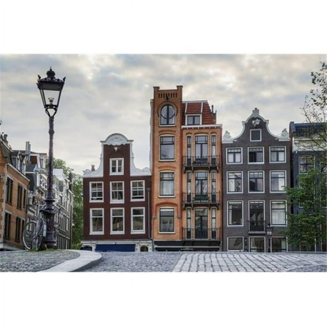 Unique residential buildings and a lamp post; Amsterdam Netherlands ...