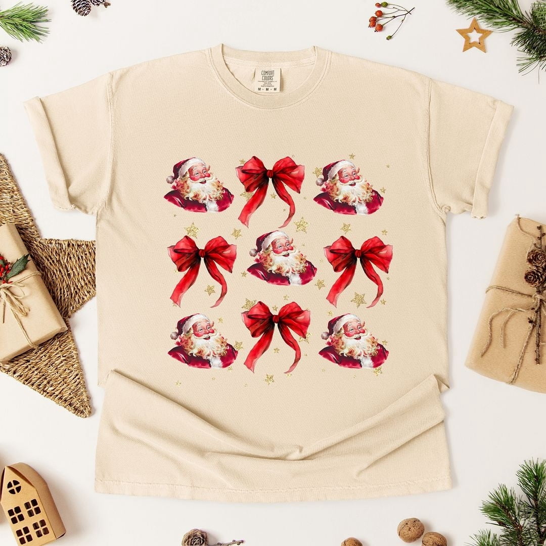 Urban Threads Co. Coquette Santa And Bow Chart Garment Dyed Tee Ivory ...