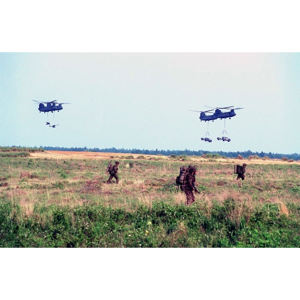 Us Army Chinook Ch-47'S Ferry In British Land Rovers During The ...