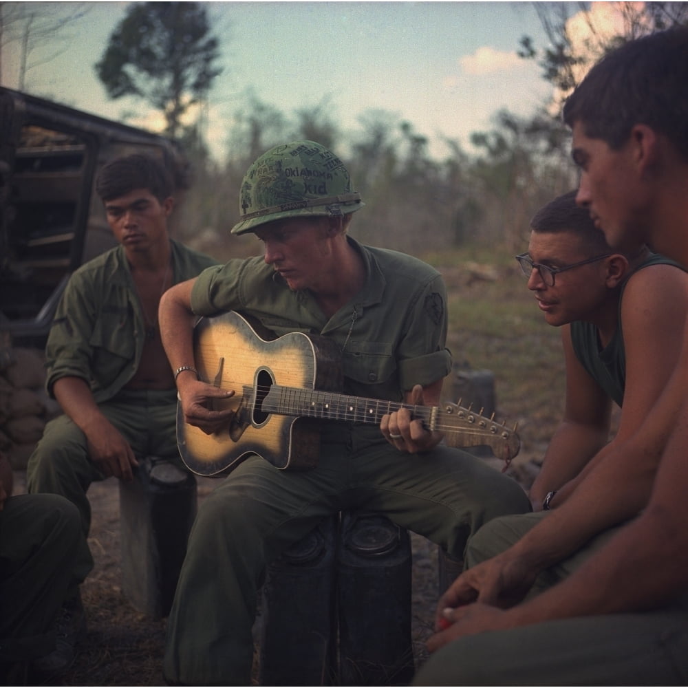 Vietnam War. Us Army Infantrymen Gather Around A Guitar Player And Sing ...